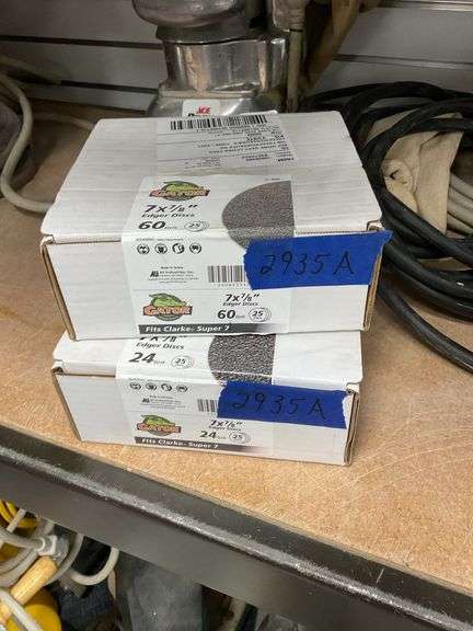 Two boxes of Gator 7x7/8 edger discs, one box is full, the other is ...
