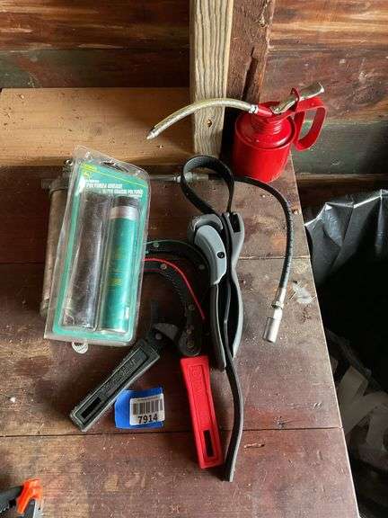 Grease guns, rubber strap wrench, misc - Hurley Real Estate & Auctions