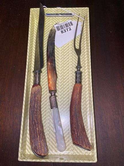 Antler handled carving knive and fork w/ sterling ferrules, and mother ...