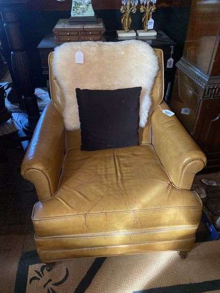 Leather arm chair w/ sheepskin throw, and throw pillow 31x35x32 ...