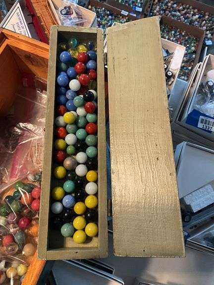 Wooden box of marbles - Hurley Real Estate & Auctions