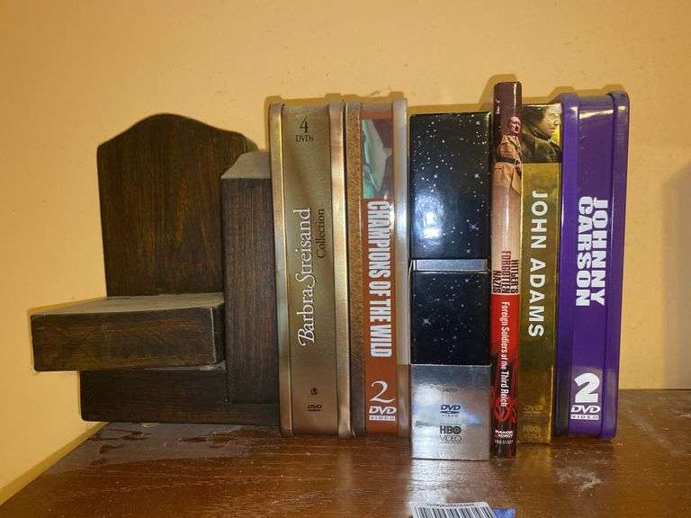 Lot of DVD sets, pair of wooden bookends - Hurley Real Estate & Auctions