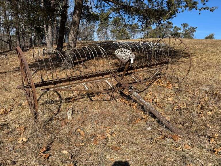 Old hay dump rake. 12’ wide - Hurley Real Estate & Auctions