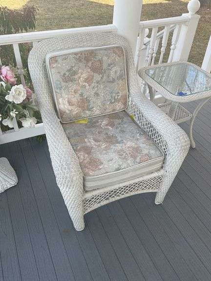 White wicker arm chair w/ floral cushions - Hurley Real Estate & Auctions