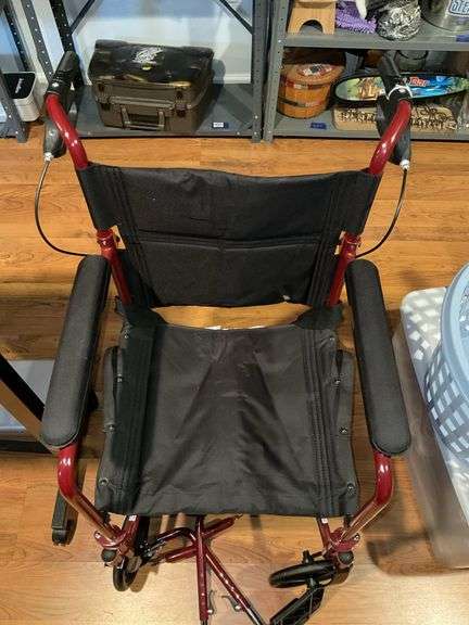 Folding transport chair w/ leg rests - Hurley Real Estate & Auctions