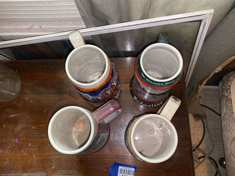 Four Budweiser collector mugs - Hurley Real Estate & Auctions