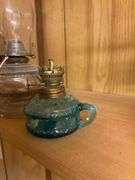 Two glass finger oil lamps, and miniature blue finger lamp - Hurley ...