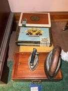 Two sad irons, wooden box, cigar boxes - Hurley Real Estate & Auctions