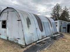 Metal Quonset hut outbuilding. 24 ft x 10 ft, To be removed by buyer ...