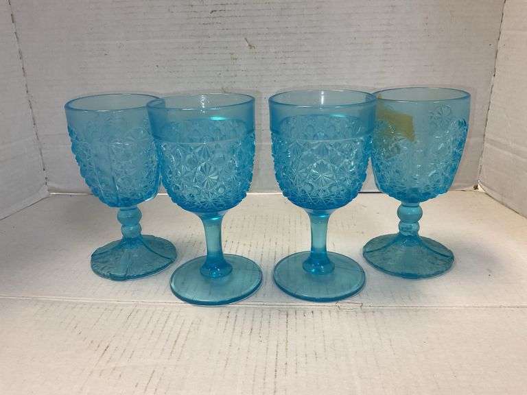 Four blue Daisy & Button goblets - Hurley Real Estate & Auctions