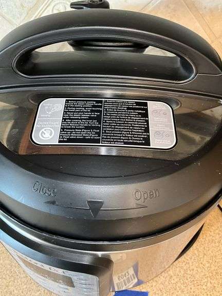 Instant Pot w/ booklet - Hurley Real Estate & Auctions