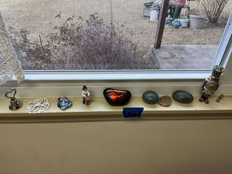Stained glass trinkets, figurines, paperweights in window - Hurley Real ...