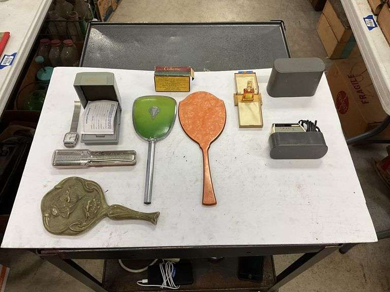 Vanity items: hand mirrors, electric razor, perfume, wrist watch ...