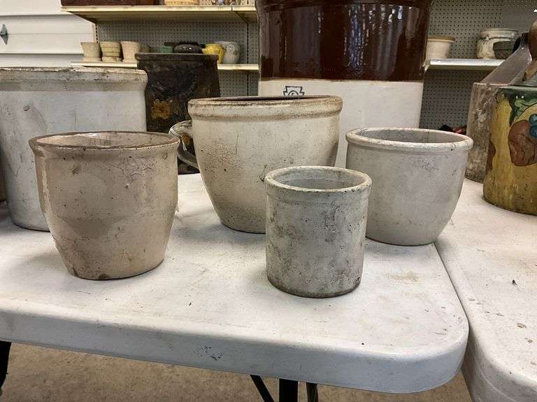 Four stoneware crocks including one w/ applied handle - Hurley Real ...