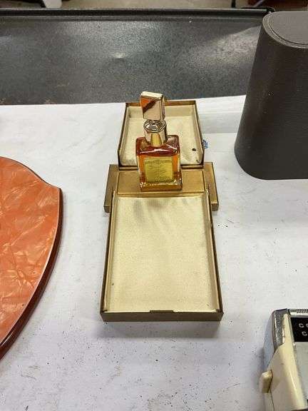 Vanity items: hand mirrors, electric razor, perfume, wrist watch ...