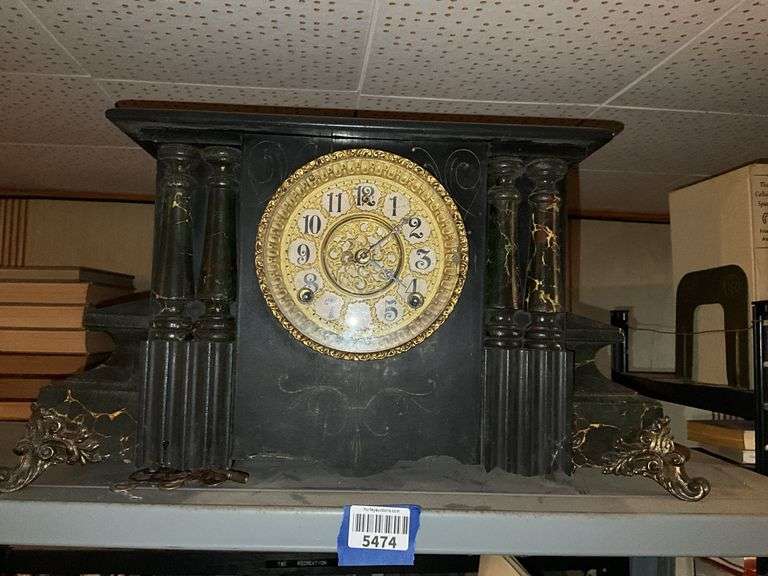Gilbert black pillar mantel clock - Hurley Real Estate & Auctions