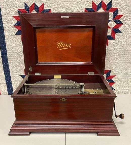 MIRA disc music box in mahogany finish case w/ large group of 27 discs ...