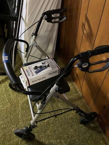 Lumex roller walker w/ hand brakes - Hurley Real Estate & Auctions