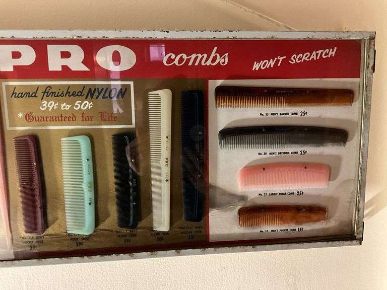 PRO COMBS advertising barbershop display - Hurley Real Estate & Auctions