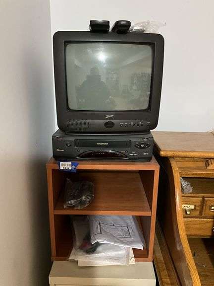 Zenith TV, Magnavox VHS player, and TV stand w/ contents - Hurley Real ...