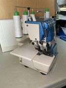 Singer Professional 14U13 sewing machine - Hurley Real Estate & Auctions