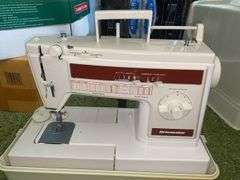Dressmaker portable sewing machine w/ booklet - Hurley Real Estate ...