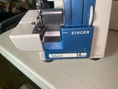 Singer Professional 14U13 sewing machine - Hurley Real Estate & Auctions
