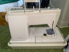 Dressmaker portable sewing machine w/ booklet - Hurley Real Estate ...