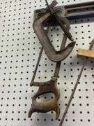 Level, paddle bits, C clamp, hack saw hanging on pegboard - Hurley Real ...
