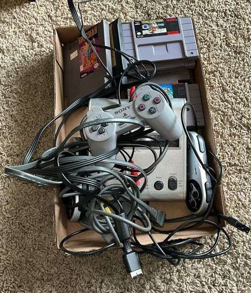 Game system with 8 Nintendo games - Hurley Real Estate & Auctions