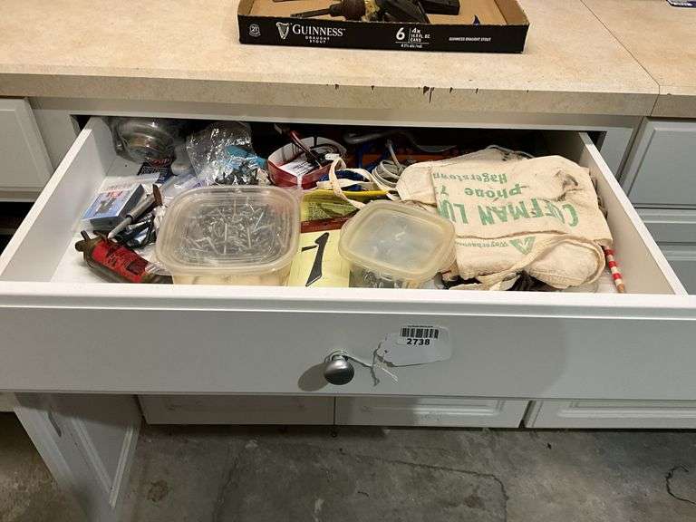 Contents of drawer and cupboard: misc tools and painting supplies ...