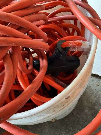 Heavy duty extension cords in bucket - Hurley Real Estate & Auctions