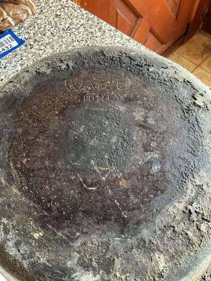Two Wagner cast iron skillets - Hurley Real Estate & Auctions