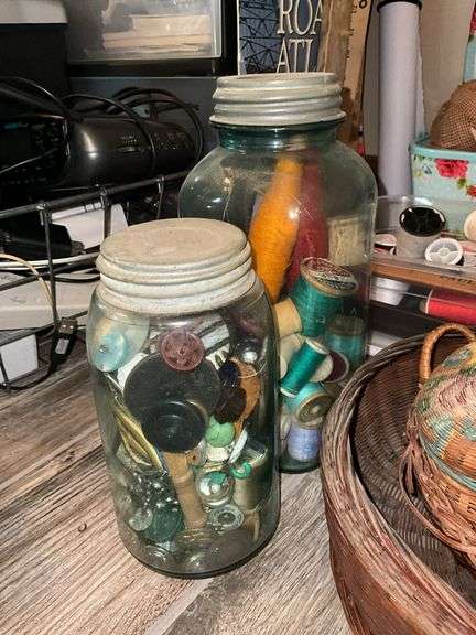 Misc sewing notions, jars of buttons, old sewing baskets, yarn & more ...