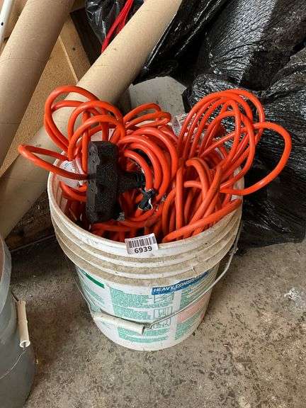 Heavy duty extension cords in bucket - Hurley Real Estate & Auctions