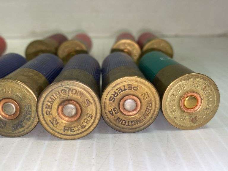 19 Mixed 12 gauge 2-3/4" high brass shells - 17 shot and 2 slugs ...