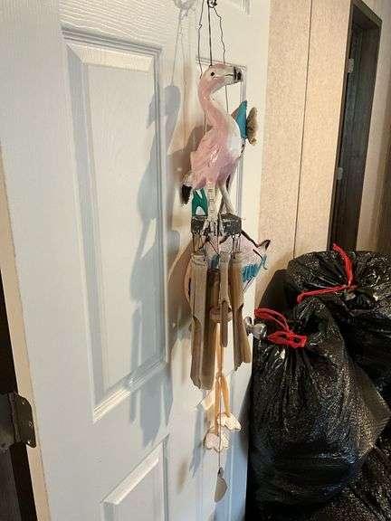 Hanging flamingo decor - Hurley Real Estate & Auctions