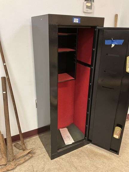 Homak 12 gun security cabinet. 21x16x55.5 - Hurley Real Estate & Auctions