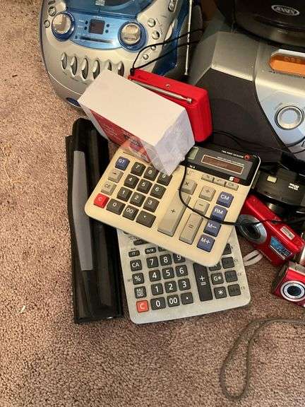 Electronics lot including: CD players, cameras, digital clock ...