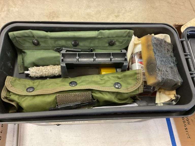 Ammo box w/ gun cleaning supplies - Hurley Real Estate & Auctions