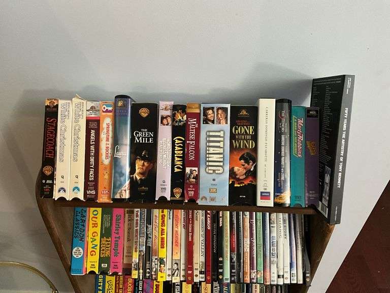 Shelf unit and DVD/VHS tape contents - Hurley Real Estate & Auctions