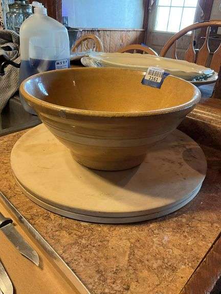 Yellow ware mixing bowl, two baking stones - Hurley Real Estate & Auctions