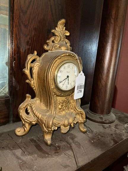 Wuersch/ France cast metal mantel clock - Hurley Real Estate & Auctions
