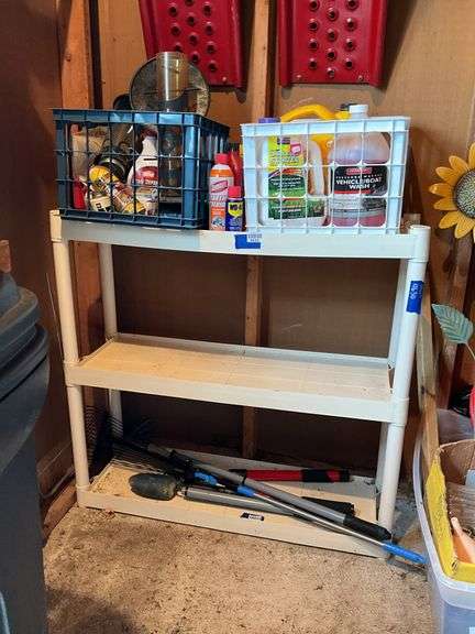 White shelf unit and top contents: garden supplies, misc - bottom shelf ...