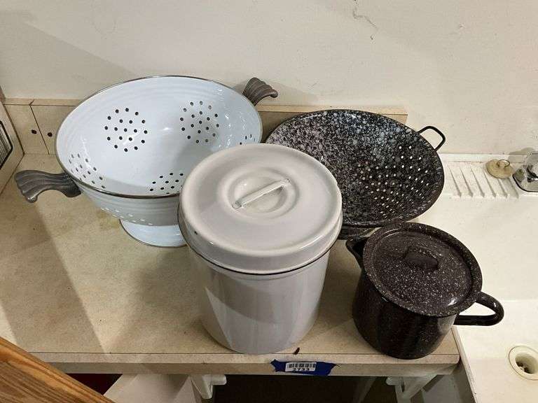 Speckled and white enamelware: colanders, canister, covered mug ...
