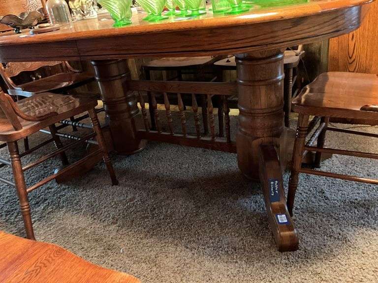 Oak dining table w/ six press back chairs, one leaf, no contents 60”x42 ...