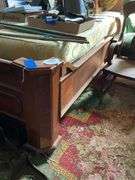 Renaissance Revival bed frame w/ carved face pediment, arched panel ...