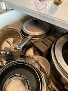 Contents of drawer: cookware, food mill, measuring cups, misc kitchenware - Hurley Real Estate ...