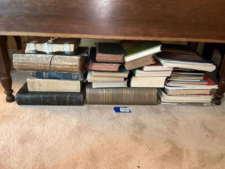 Book lot under table - Hurley Real Estate & Auctions