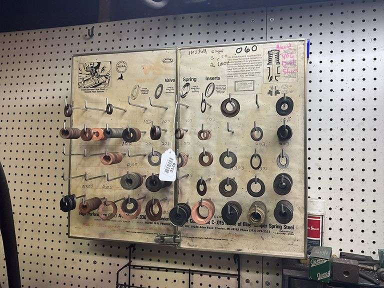 Lot of valve spring inserts w/ display cabinet - Hurley Real Estate ...